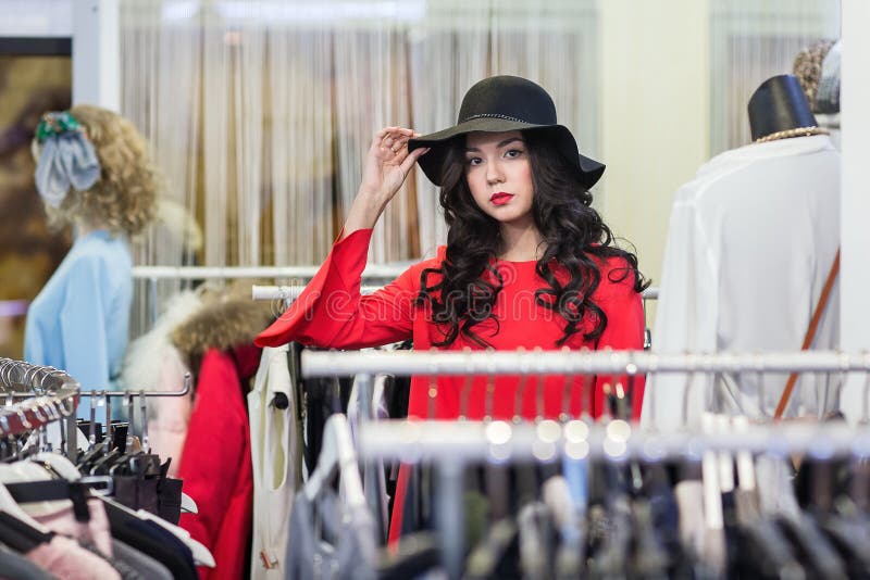 Woman is in the Ready-made Shop Stock Photo - Image of center, hanger ...