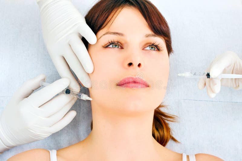 Woman Receiving an Injection of Botox Stock Photo - Image of listening ...