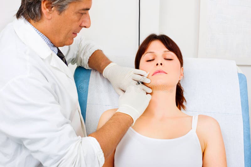 Woman Receiving an Injection of Botox from a Docto Stock Photo - Image ...