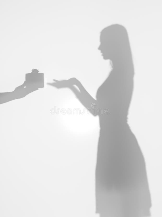 Woman Receiving a Present, Side View, Silhouette Stock Image - Image of ...