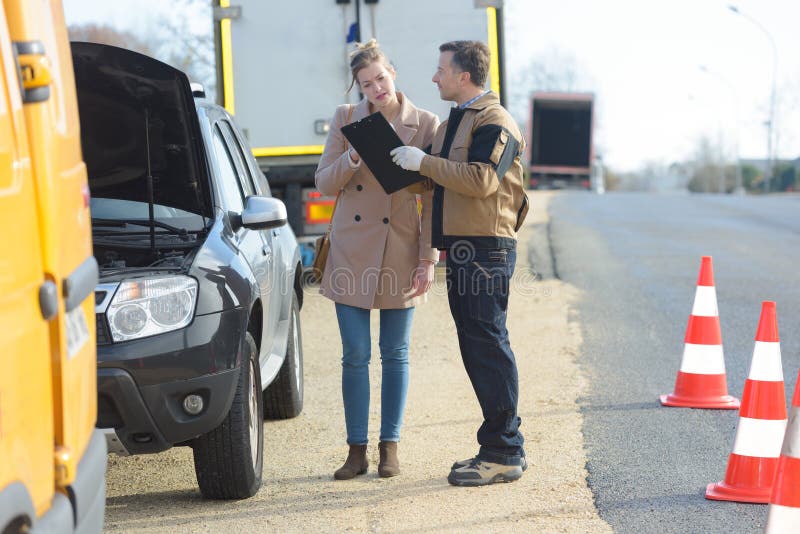 Woman with Recovery Driver beside Road Stock Image - Image of failure ...