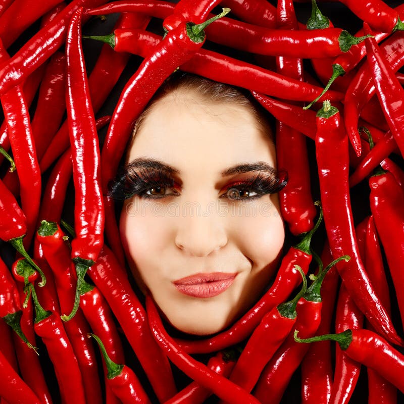 Woman and red chili pepper stock image. Image of eatable - 50996057
