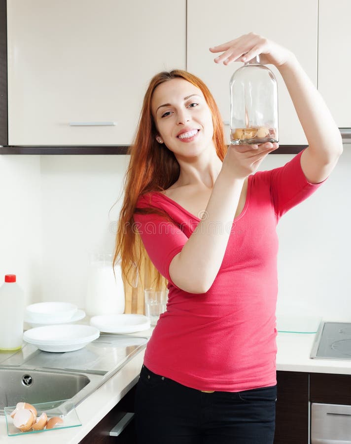 Woman in Red Cleaning Bottle with Egg Shell Stock Image - Image of ...
