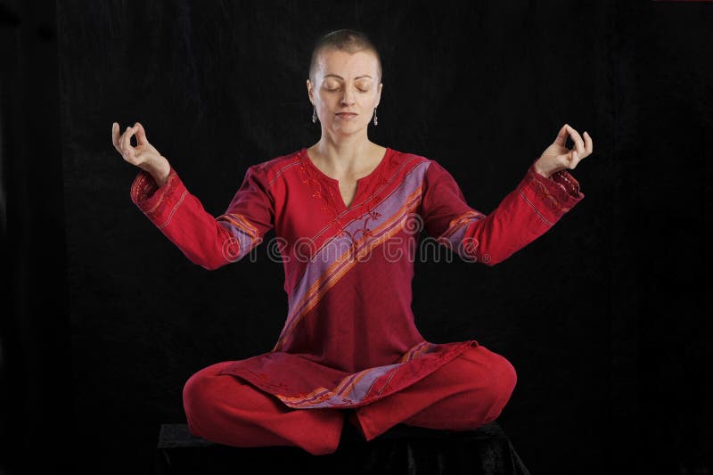 Woman in red doing yoga stock photo. Image of closed - 21927792