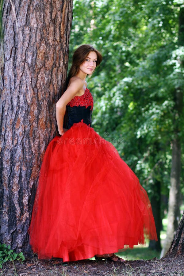 Woman in a Red Gothic Dress Stock Photo - Image of beauty, pond: 35227908