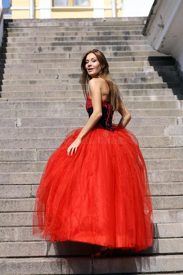 Woman in a Red Gothic Dress Stock Image - Image of joyful, female: 35228287
