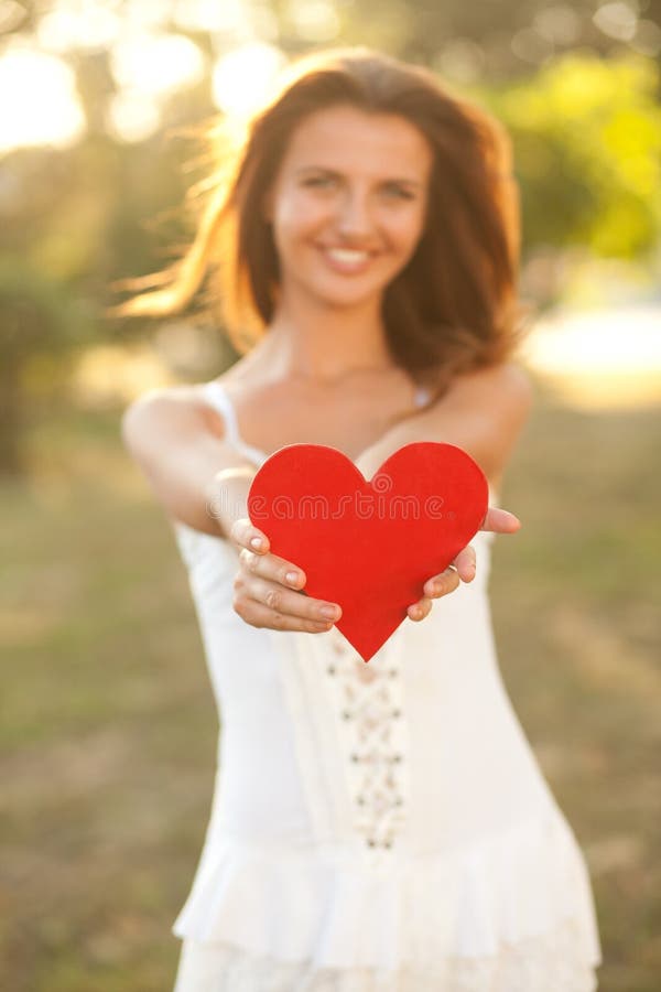 Woman with red heart stock image. Image of beautiful - 26813951
