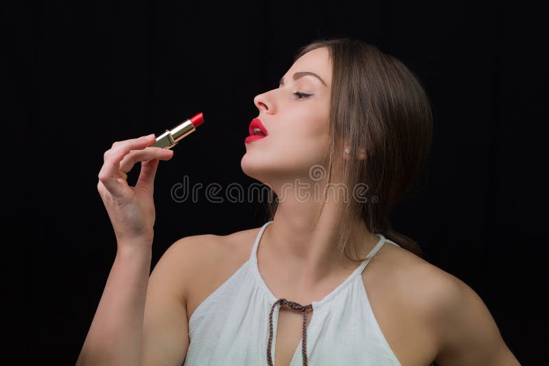 Woman with a red lipstick stock image. Image of face - 64893499