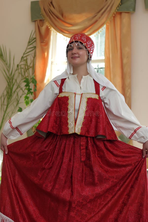 Woman in red sarafan stock photo. Image of lifestyles - 10430652