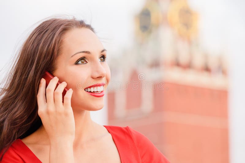 Woman on Red Square stock image. Image of cute, cellphone - 16867901