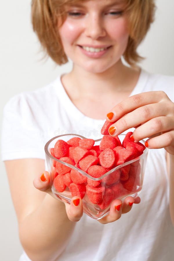 Woman with red sweets stock photo. Image of giving, valentine - 21531854