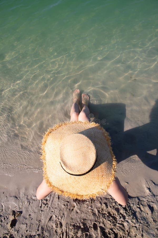 Woman In Red Swimsuit Sitting At Sandy Beach Stock Image Image Of