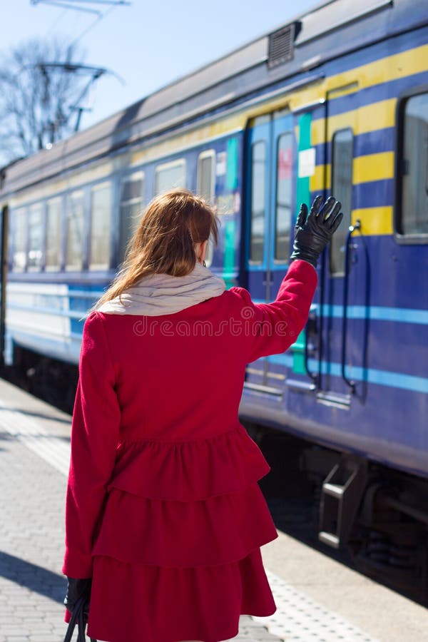 Woman Red Waving Hand Platform Stock Photos - Free & Royalty-Free Stock ...