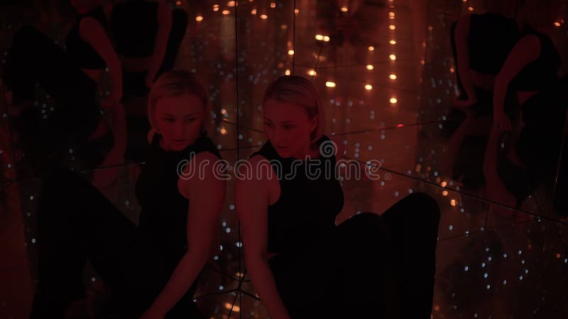 Infinity Reflection Room with Mirrors and Lights, Showcasing a Woman ...