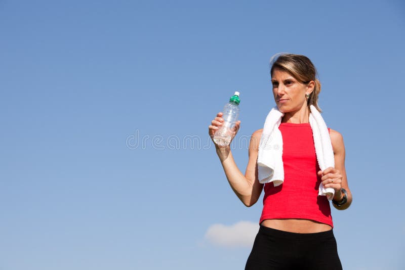 Woman Refreshing after the Exercise Stock Image - Image of beautiful ...
