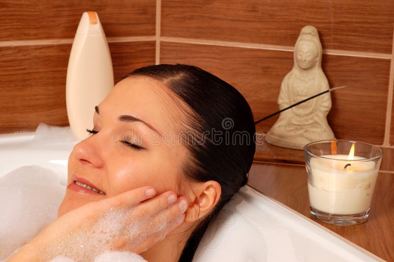 Woman relaxing in bath stock image. Image of bathrobe - 4931269