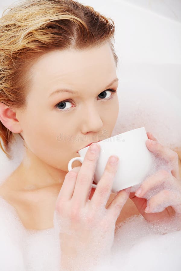 Woman Relaxing in Bath, Drinking Cup of Coffee Stock Photo - Image of ...