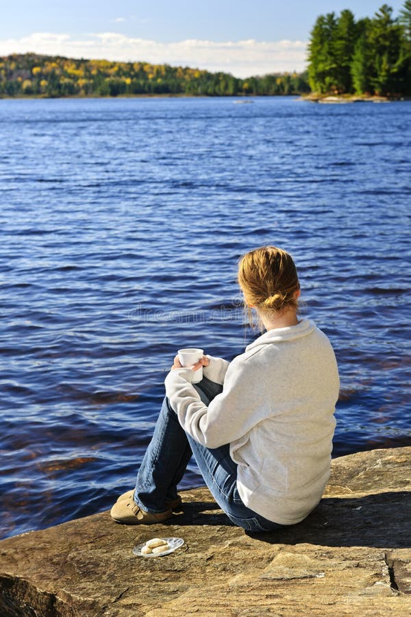 Woman Relaxing at Beautiful Lake Stock Photo - Image of relaxing ...