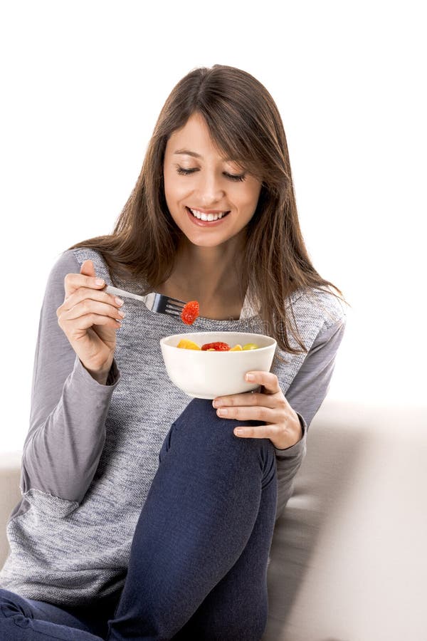 Woman relaxing and eating stock photo. Image of diet - 59127566