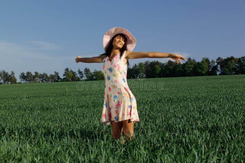 Woman relaxing on field stock photo. Image of leisure - 30633590