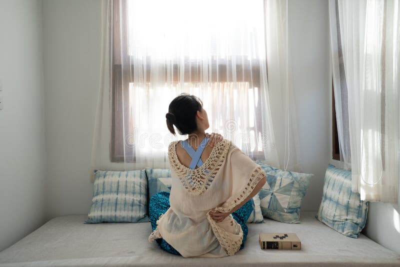 Woman Relaxing at Home Sitting in Front of Window Stock Image - Image ...