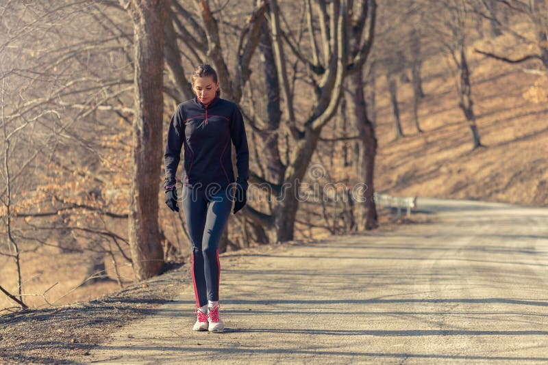 Woman Relaxing after a Long Run in the Woods Stock Image - Image of ...