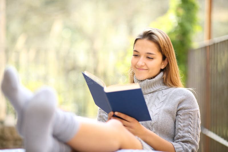 Woman Relaxing Reading a Book in a Terrace Stock Photo - Image of ...