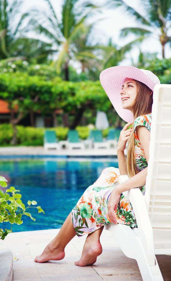 Woman relaxing at resort stock image. Image of clear - 61742585