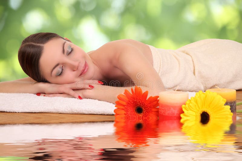 Woman relaxing in spa stock image. Image of laying, beautiful - 180805957