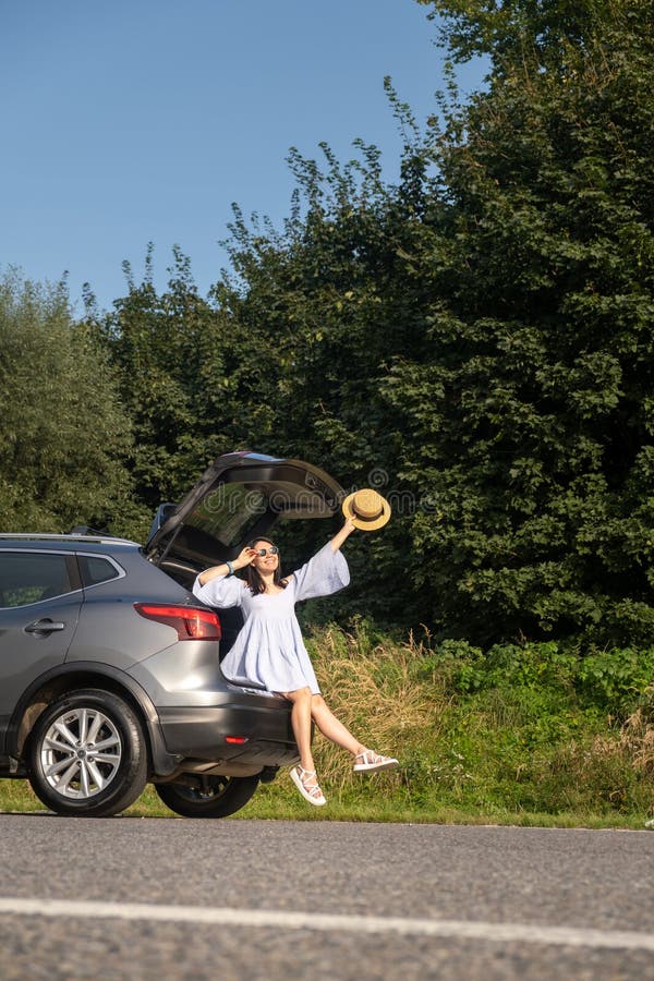 Woman Relaxing on SUV in Nature Stock Image - Image of leisure, driver ...