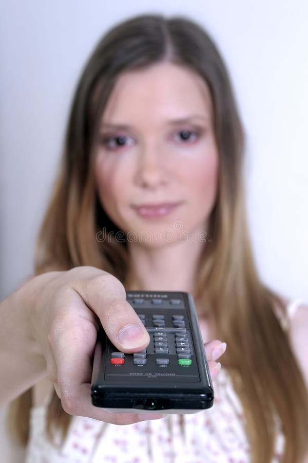 Woman with a Remote Control Stock Image - Image of control, blond: 1331315
