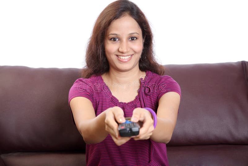 Woman with remote control stock photo. Image of remote - 24647102