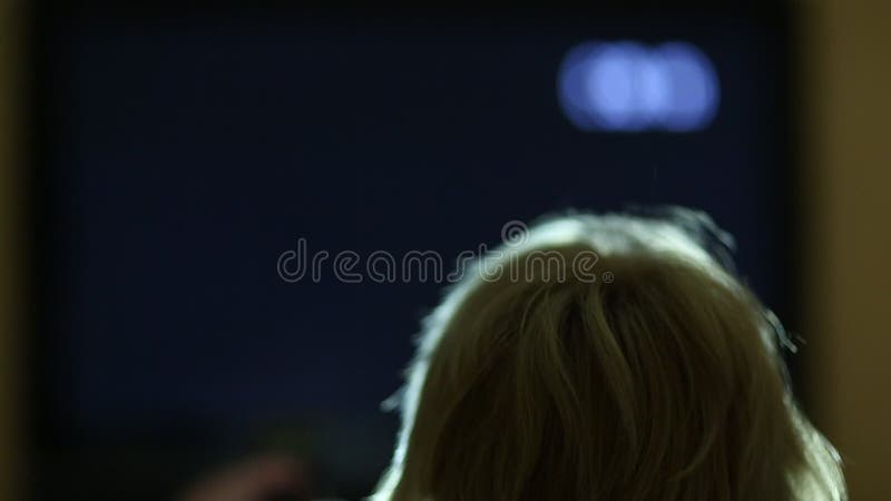 Woman with Remote Control Switching Tv Channels Stock Footage - Video ...