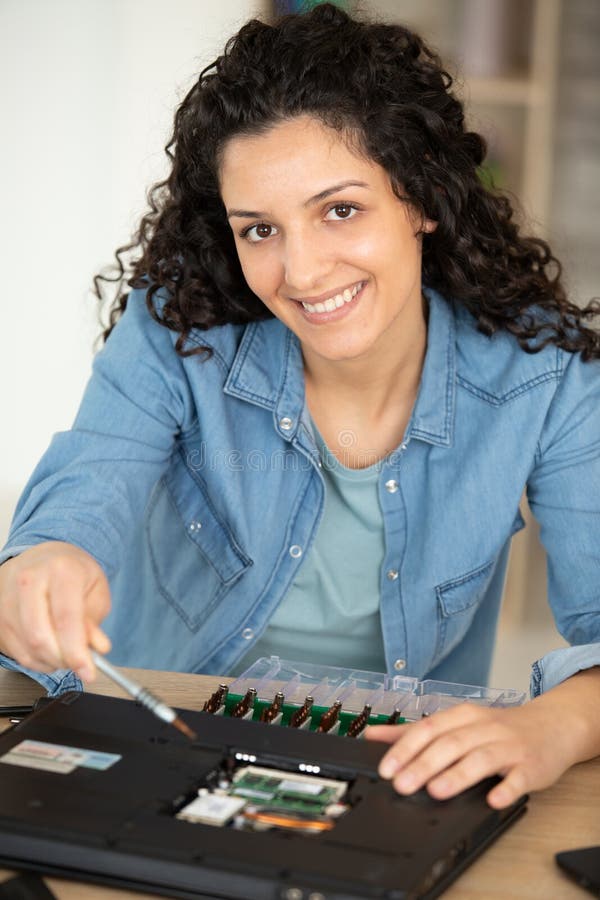 Woman Repairing Laptop with Precision Tools Stock Photo - Image of ...