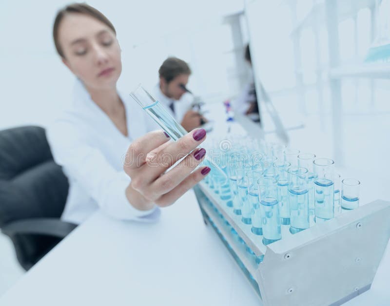 Woman Researcher is Surrounded by Medical Vials and Flasks Stock Image ...