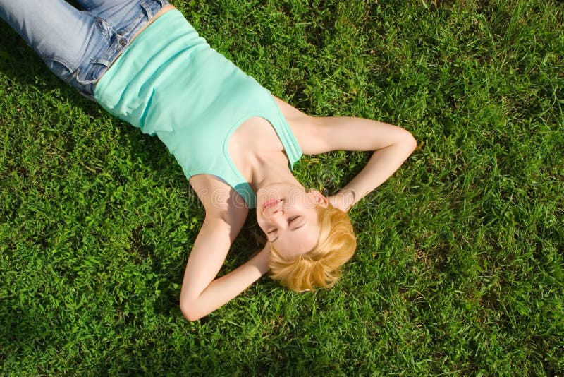Woman rest on the grass stock photo. Image of field, laughing - 6952092