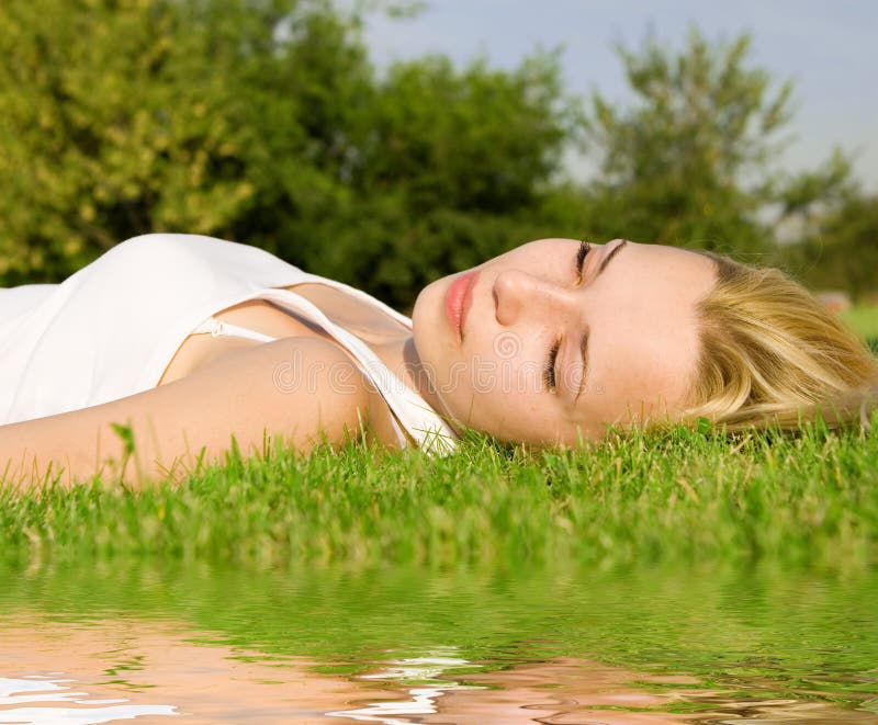 Woman Rest on the Green Grass Stock Photo - Image of lifestyles ...