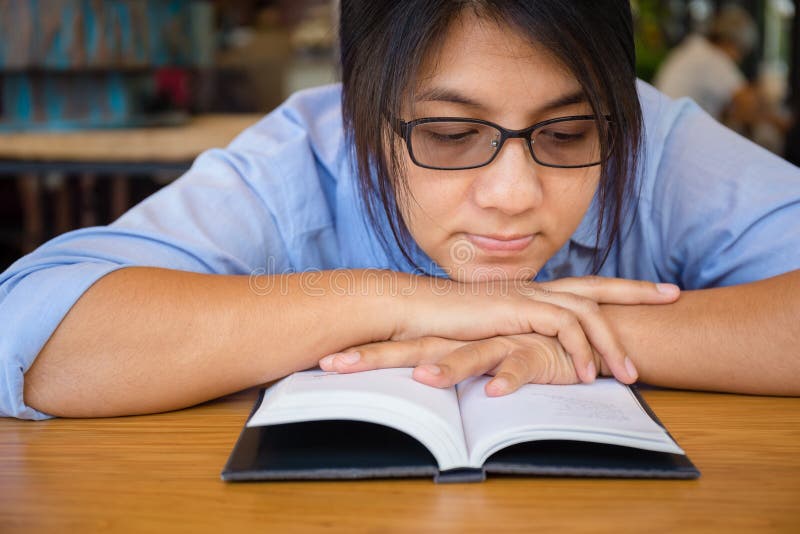 Reading Book on Table stock photo. Image of hardcover - 110501540