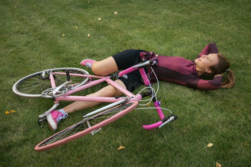 Woman Rest after Riding on Bicycle Stock Photo - Image of rider, grass ...
