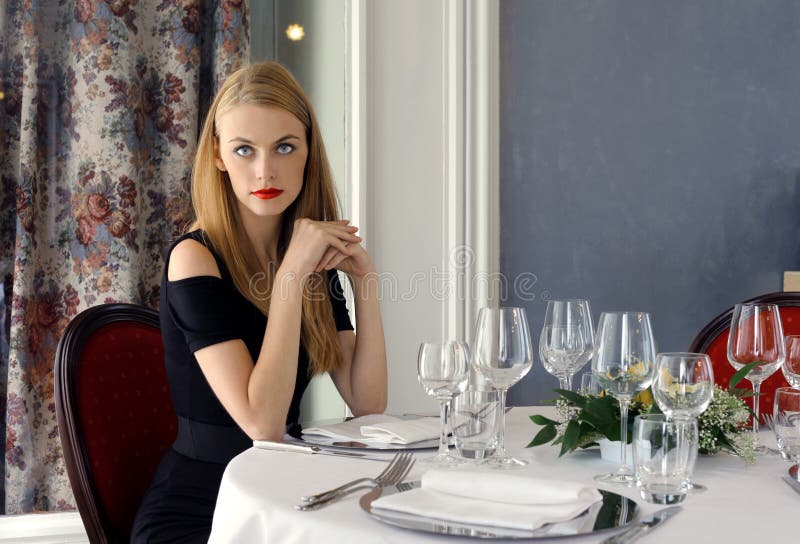 Woman at restaurant stock image. Image of table, attractive - 11237533