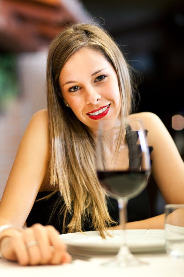 Woman in a restaurant stock photo. Image of concept, wineglass - 27694968
