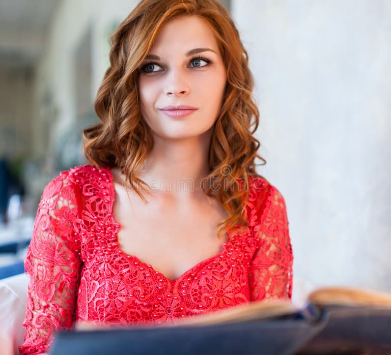 Woman in a Restaurant with the Menu in Hands Stock Photo - Image of ...