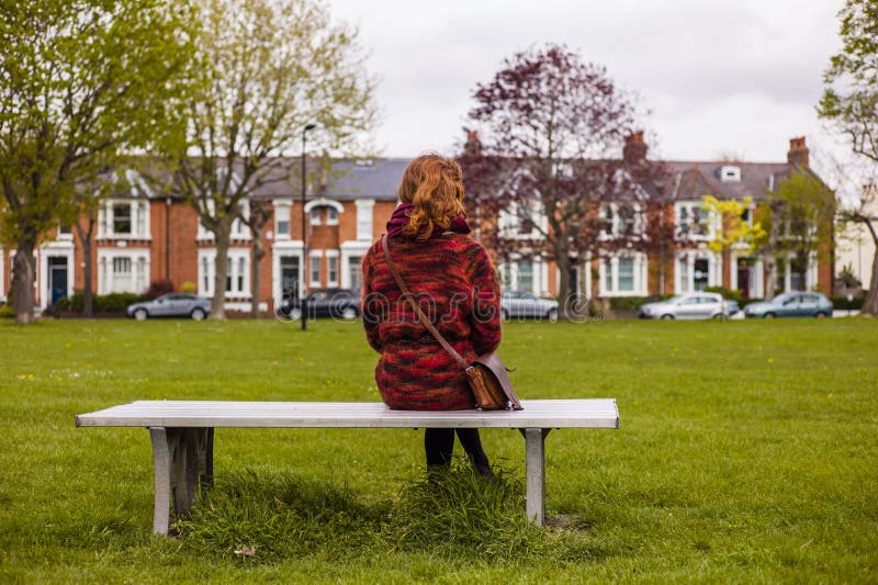 Woman Resting on Bench in a Park Stock Image - Image of season, real ...