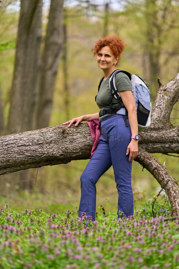 Woman Resting on Fallen Tree in Forest Stock Image - Image of foliage ...