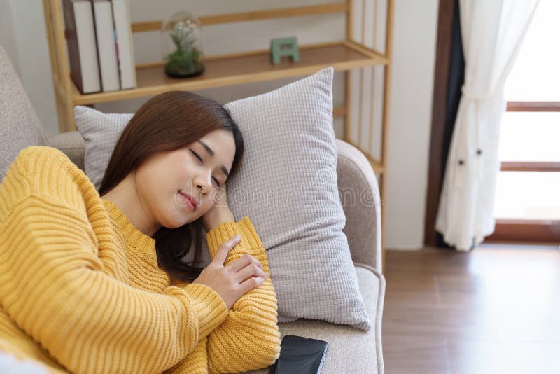 Woman Resting on the Sofa at Home Stock Image - Image of healthy ...