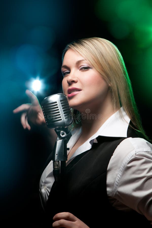 Woman with Retro Microphone Stock Photo - Image of fashion, music: 74951230