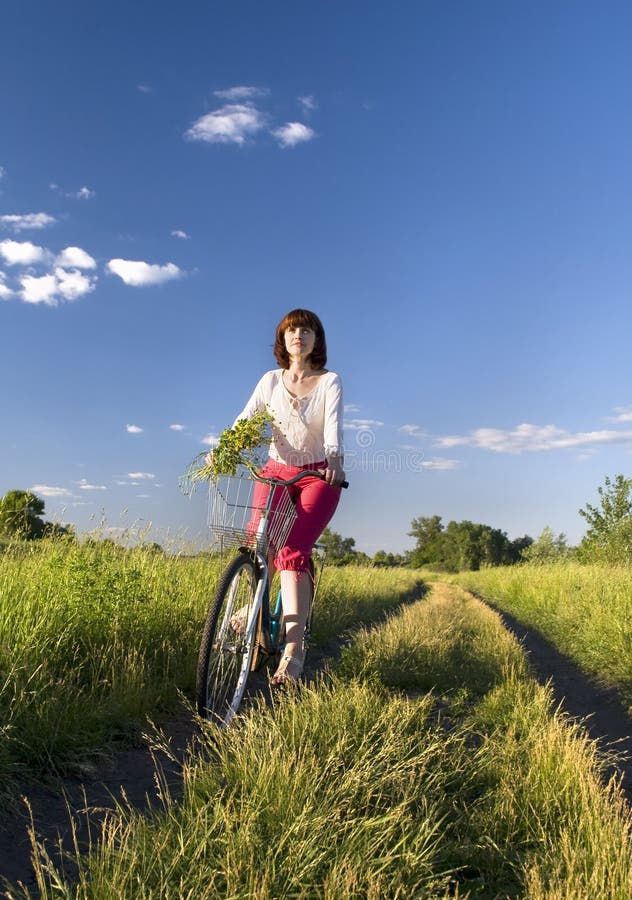 Woman riding bike stock photo. Image of bicycle, healthcare - 19804968