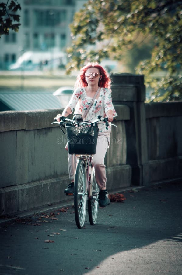 Woman Riding a Bike in a Park Editorial Stock Photo - Image of urban ...