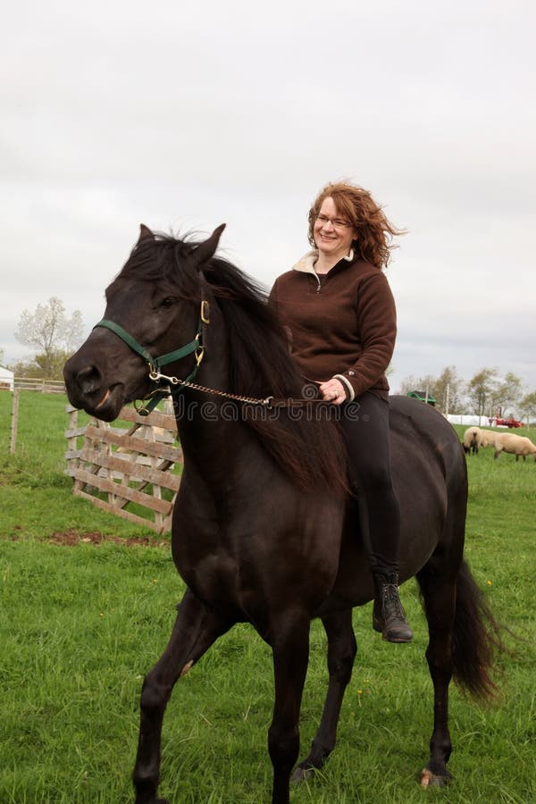 Woman riding horse stock image. Image of female, riding - 21654799