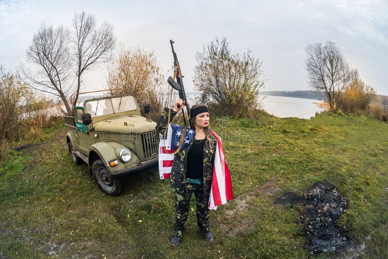 Woman with Rifle and Usa Flag on Shoulders Stock Photo - Image of ...